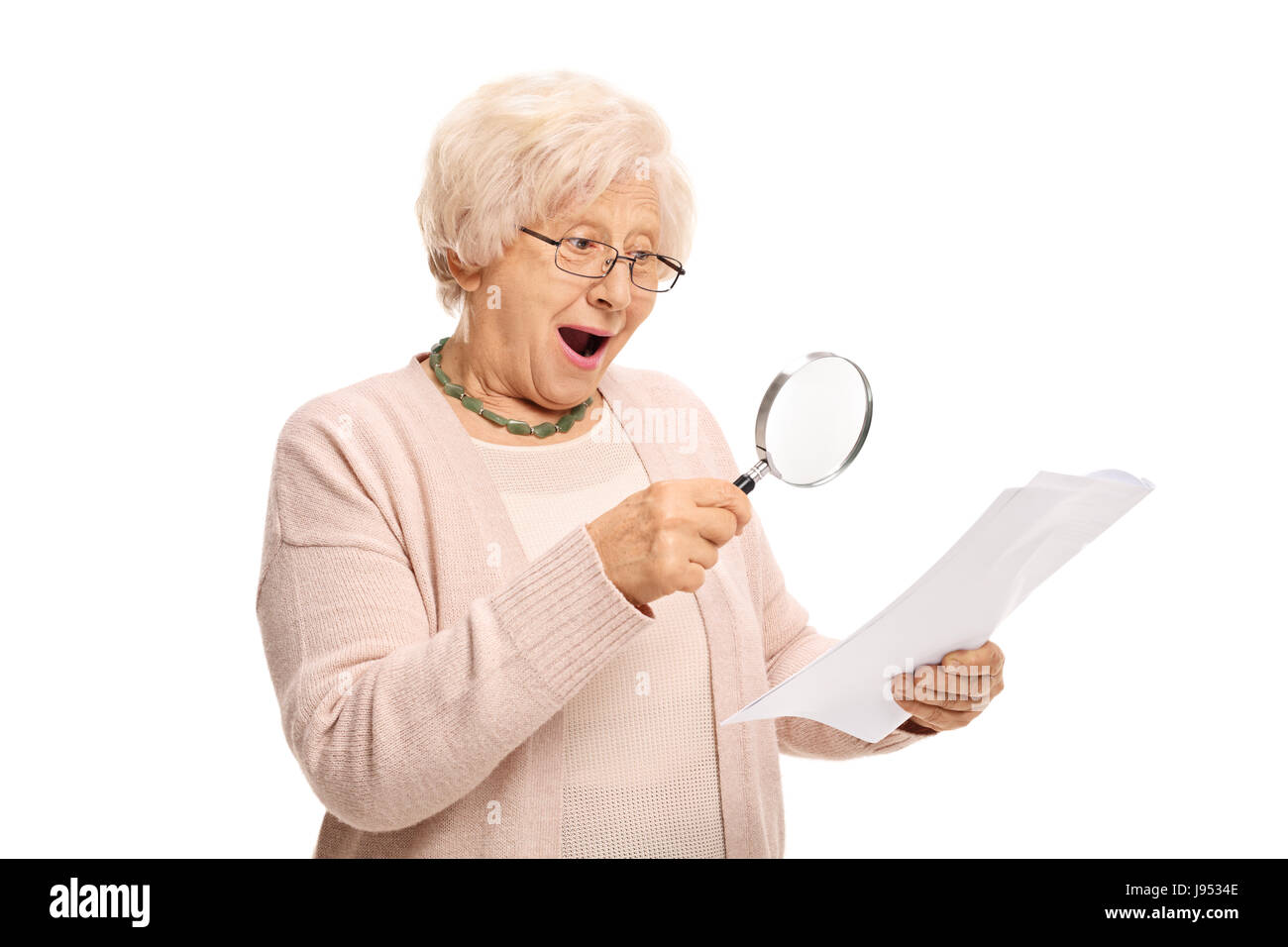 Old lady with magnifying glass hi-res stock photography and images - Alamy