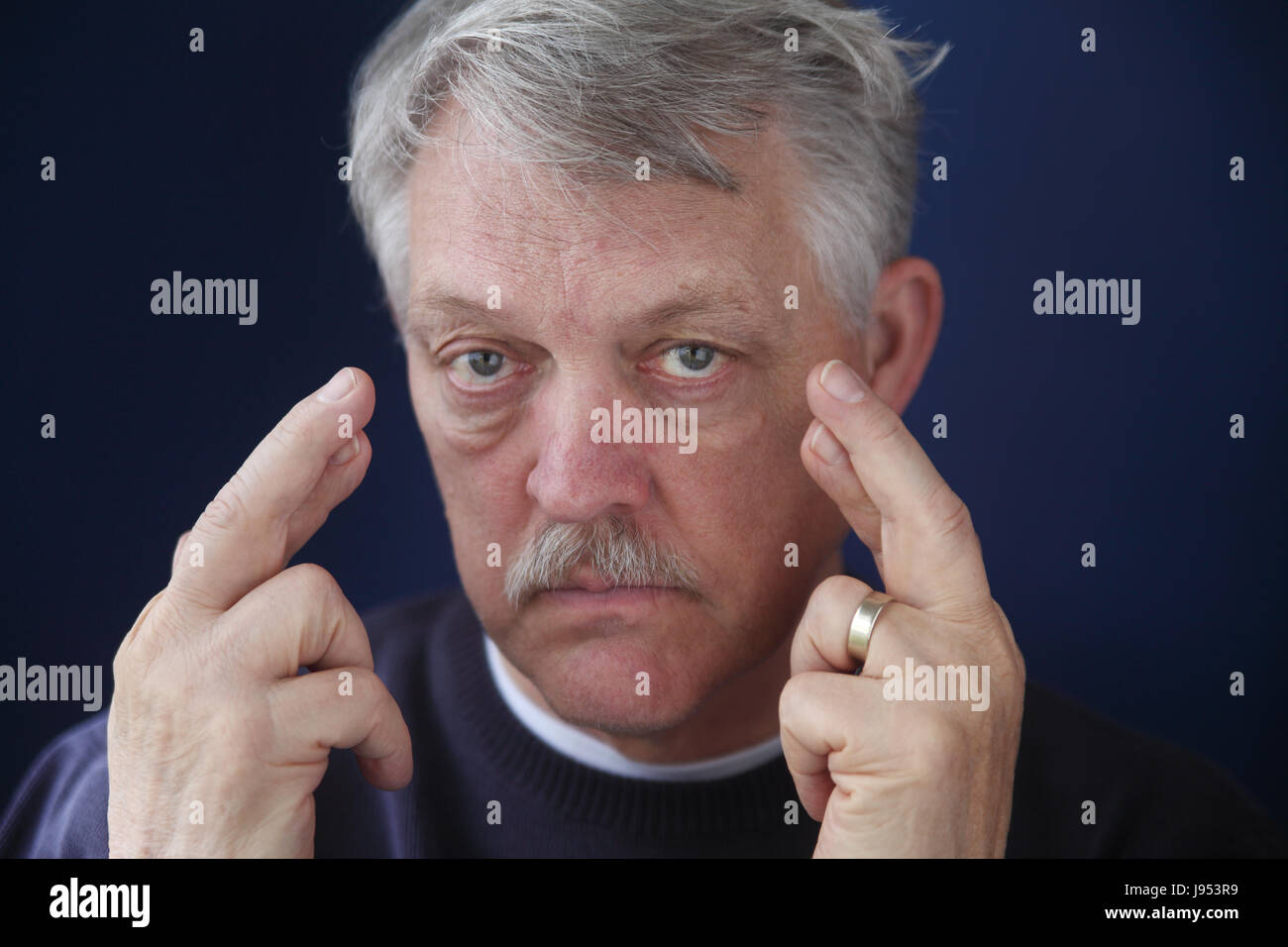 Superstitious gesture hi-res stock photography and images - Alamy