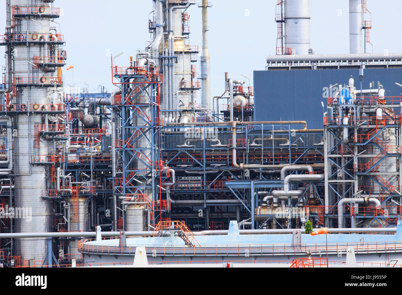 close up exterior stromg metal structure of oil refinery plant in heavy ...