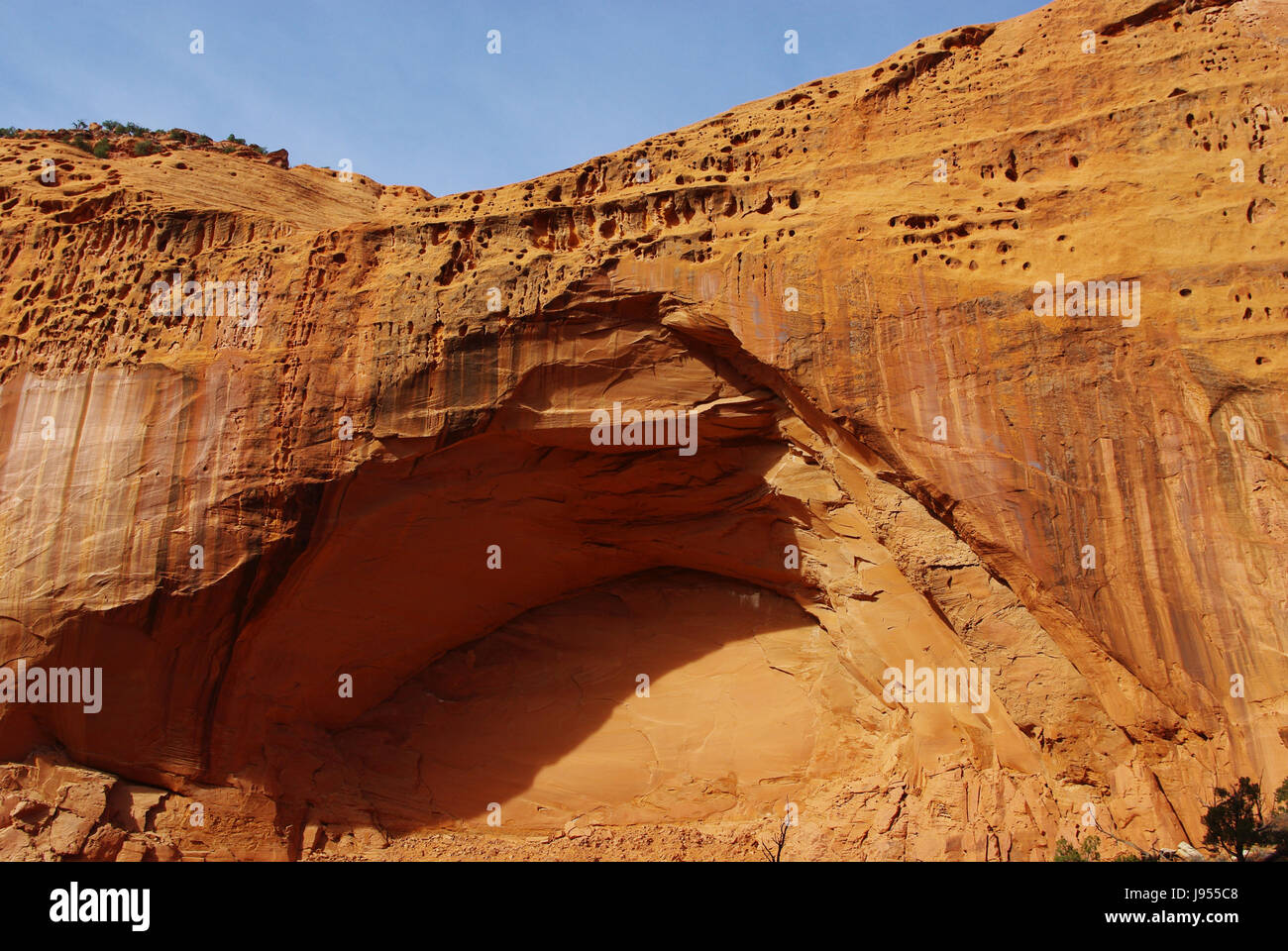 Arch in red rocks on burr trail road hi-res stock photography and ...