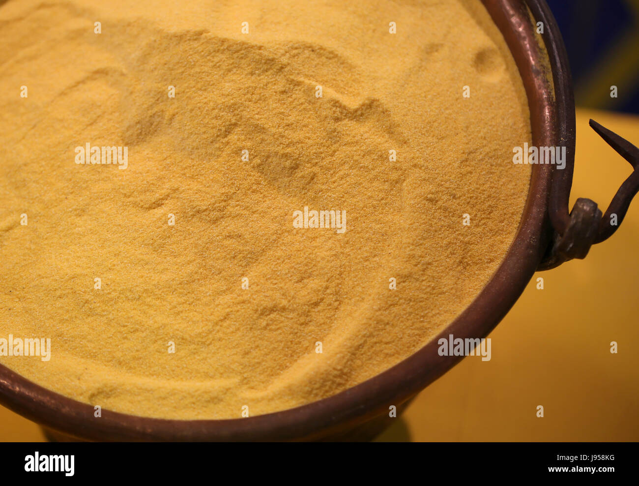 Yellow flour in the old copper pail Stock Photo - Alamy