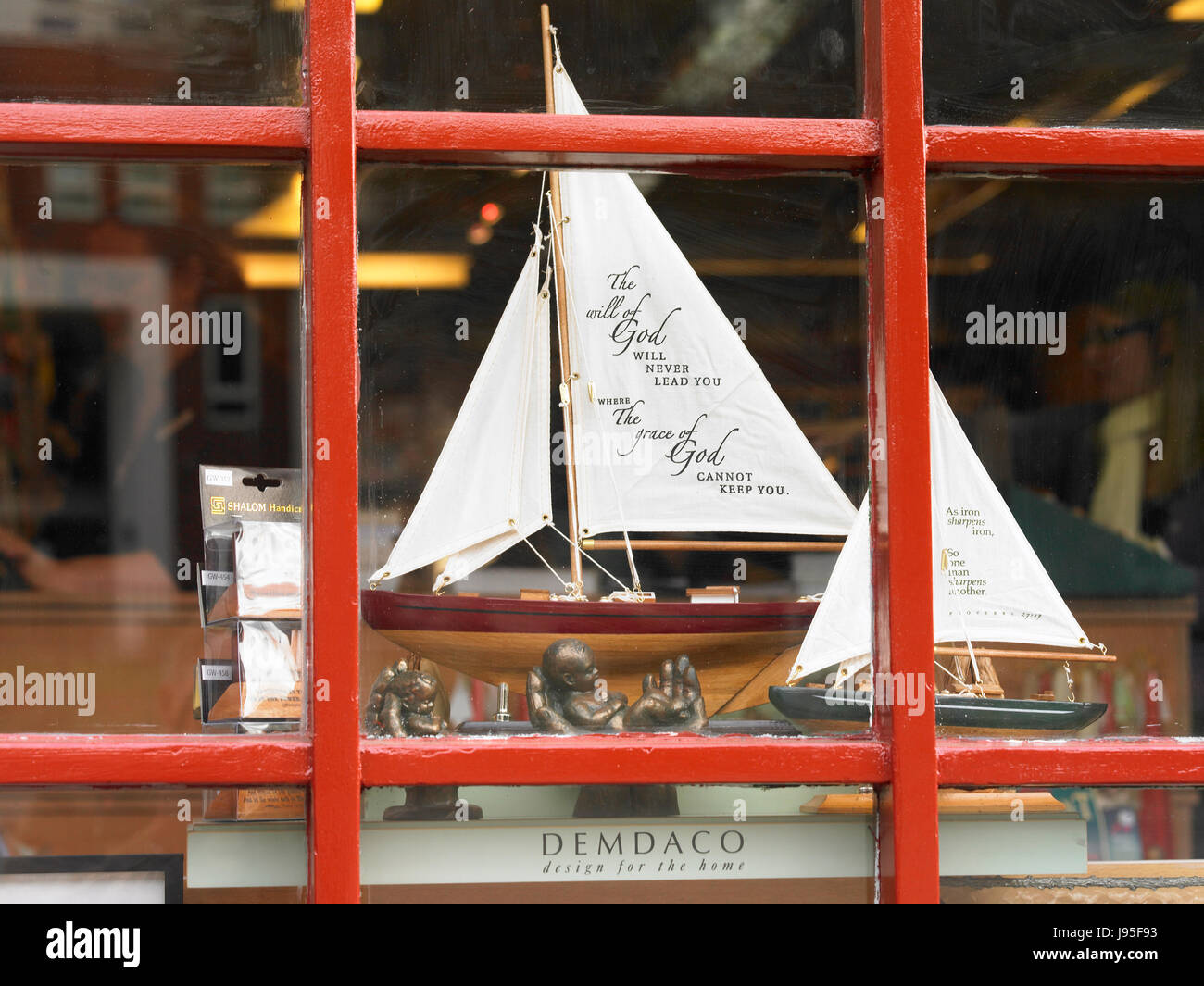 Toy boat in window Stock Photo - Alamy
