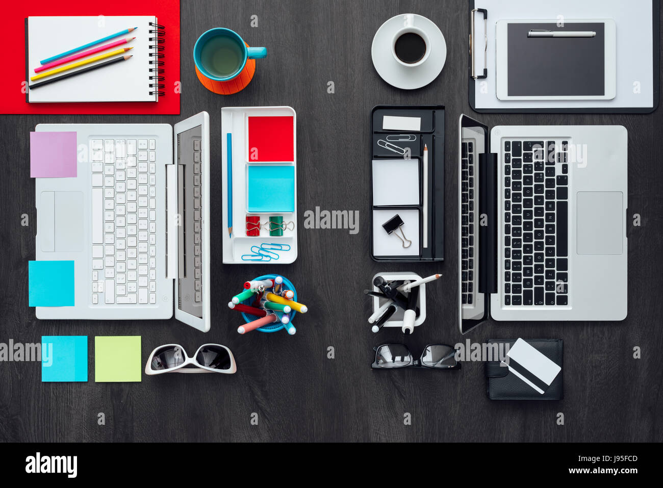 Customized office workspace: creative and colorful desktop on one side ...