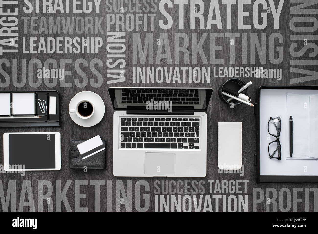 Corporate business desktop with laptop, digital tablet, accessories and ...