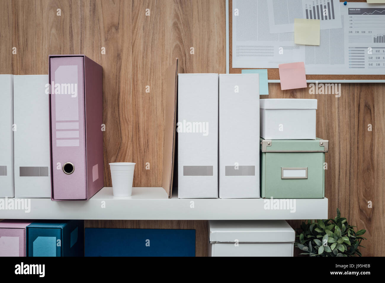 Tidy office archive on a shelf with folders and boxes Stock Photo - Alamy