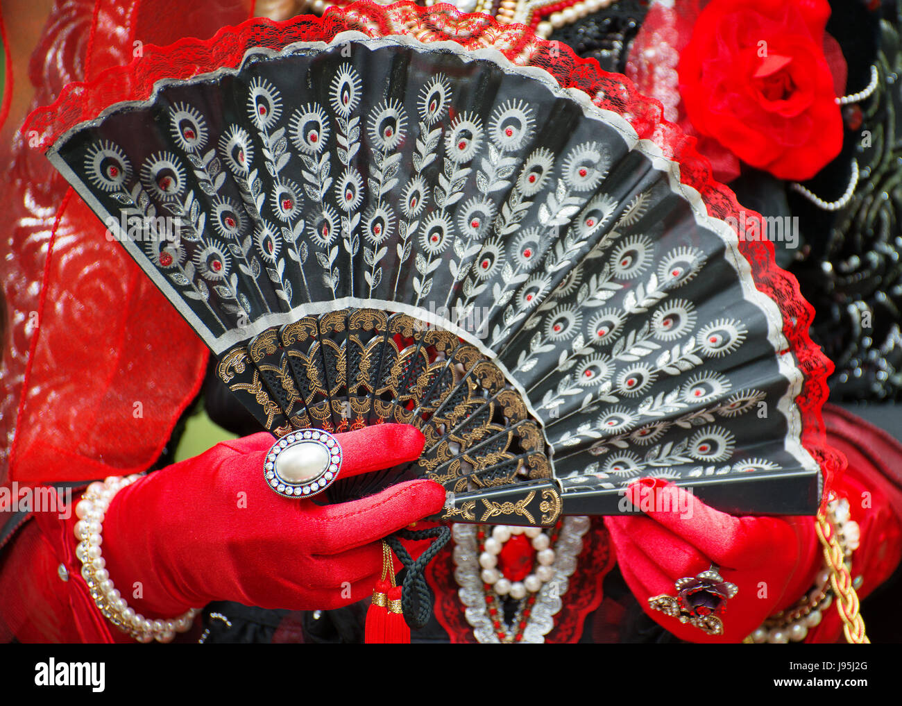Handheld fan hi-res stock photography and images - Alamy