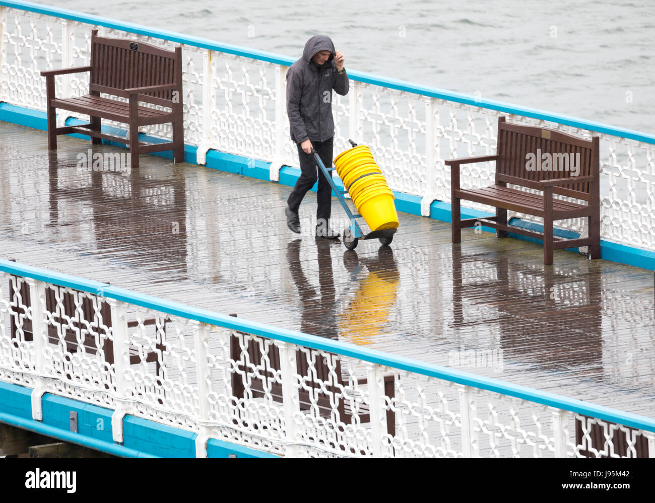 Man carrying buckets hi-res stock photography and images - Alamy