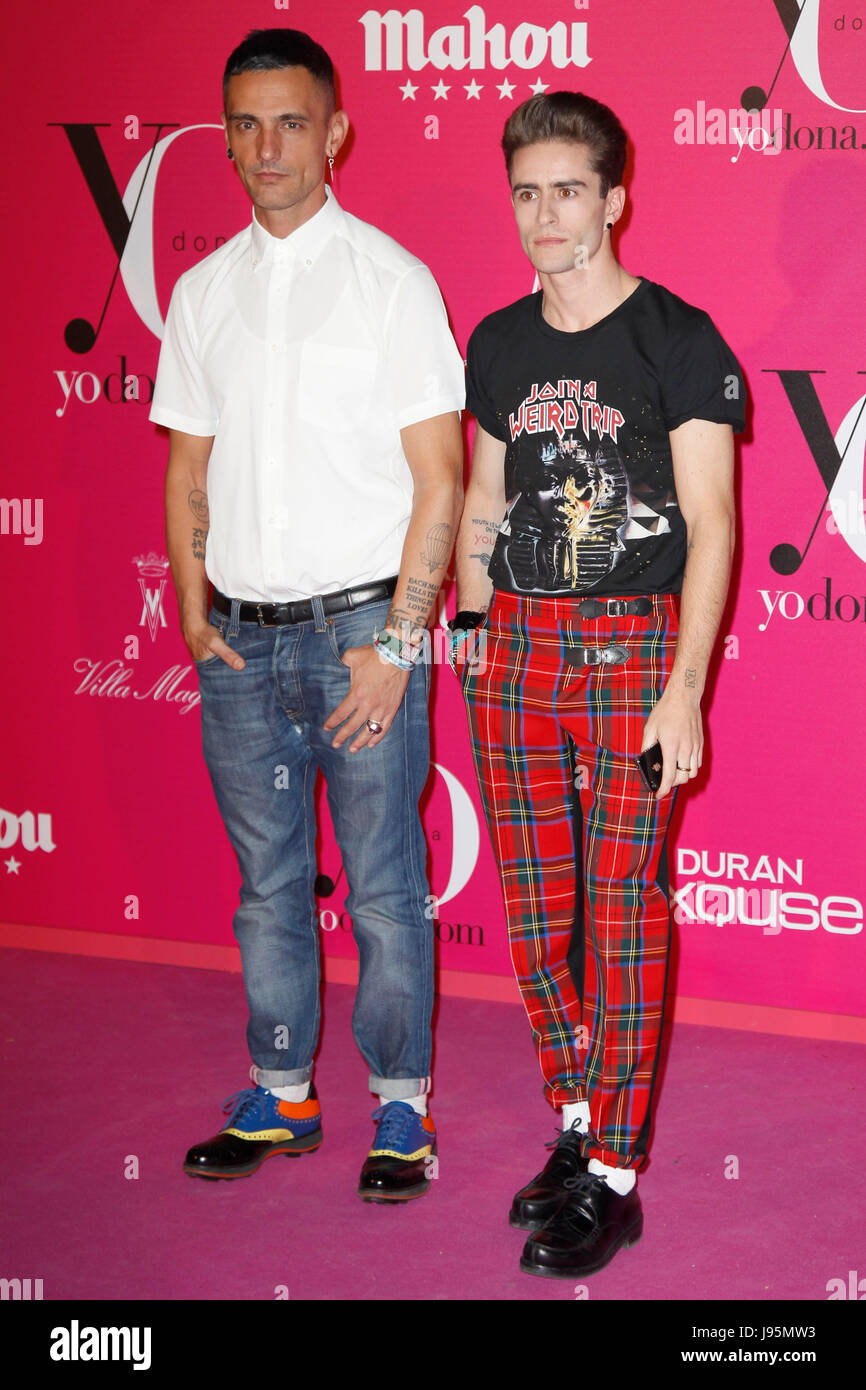 Designer David Delfin and boyfriend Pelayo Diaz during act Designer David Delfin and boyfriend Pelayo Diaz during act
