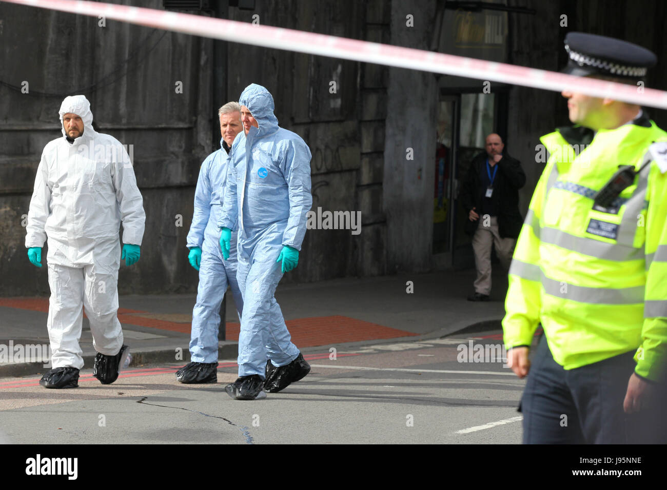 London, UK. 5th June, 2017. Forensic officers under London Bridge ...