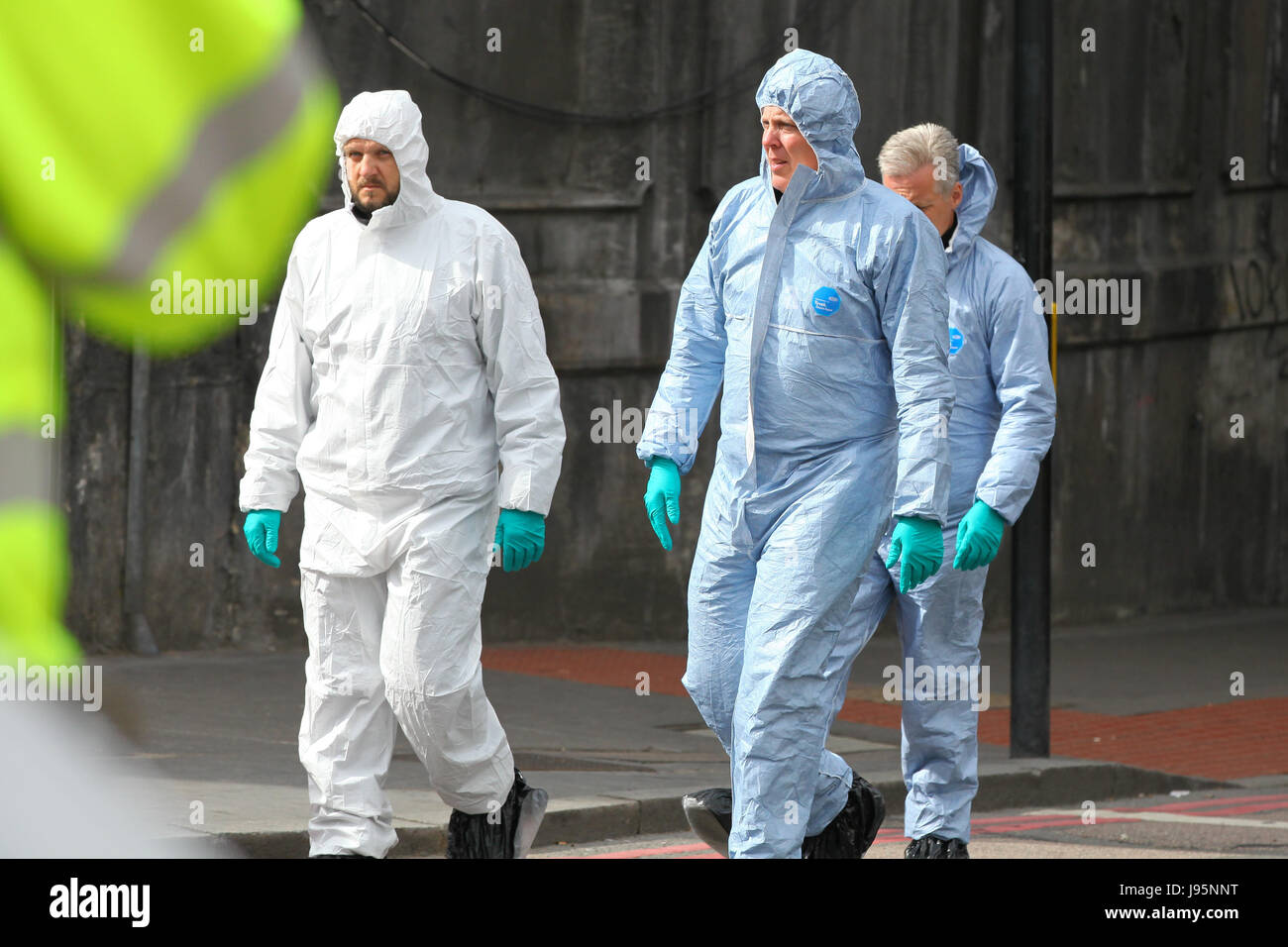 London, UK. 5th June, 2017. Forensic officers under London Bridge ...