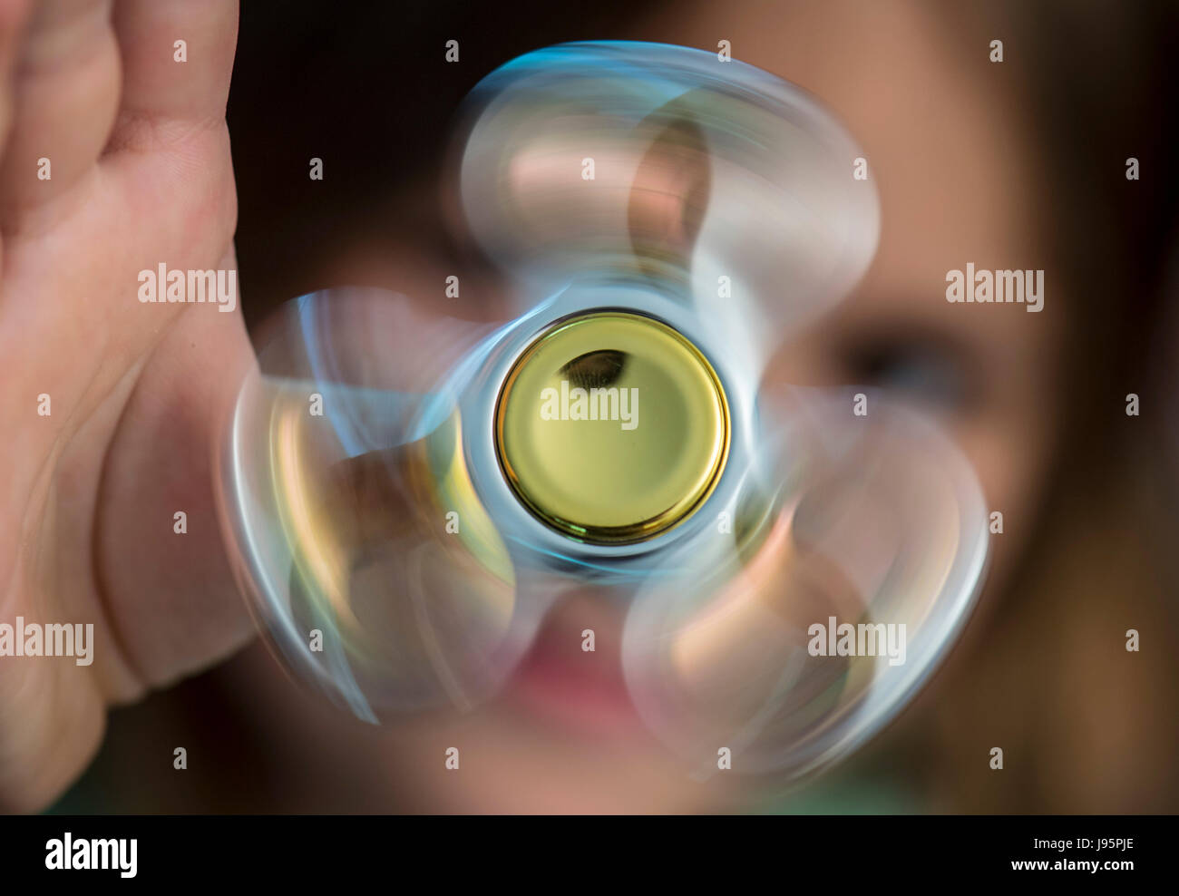 A child plays with the currently popular, supposedly stress-relieving ...