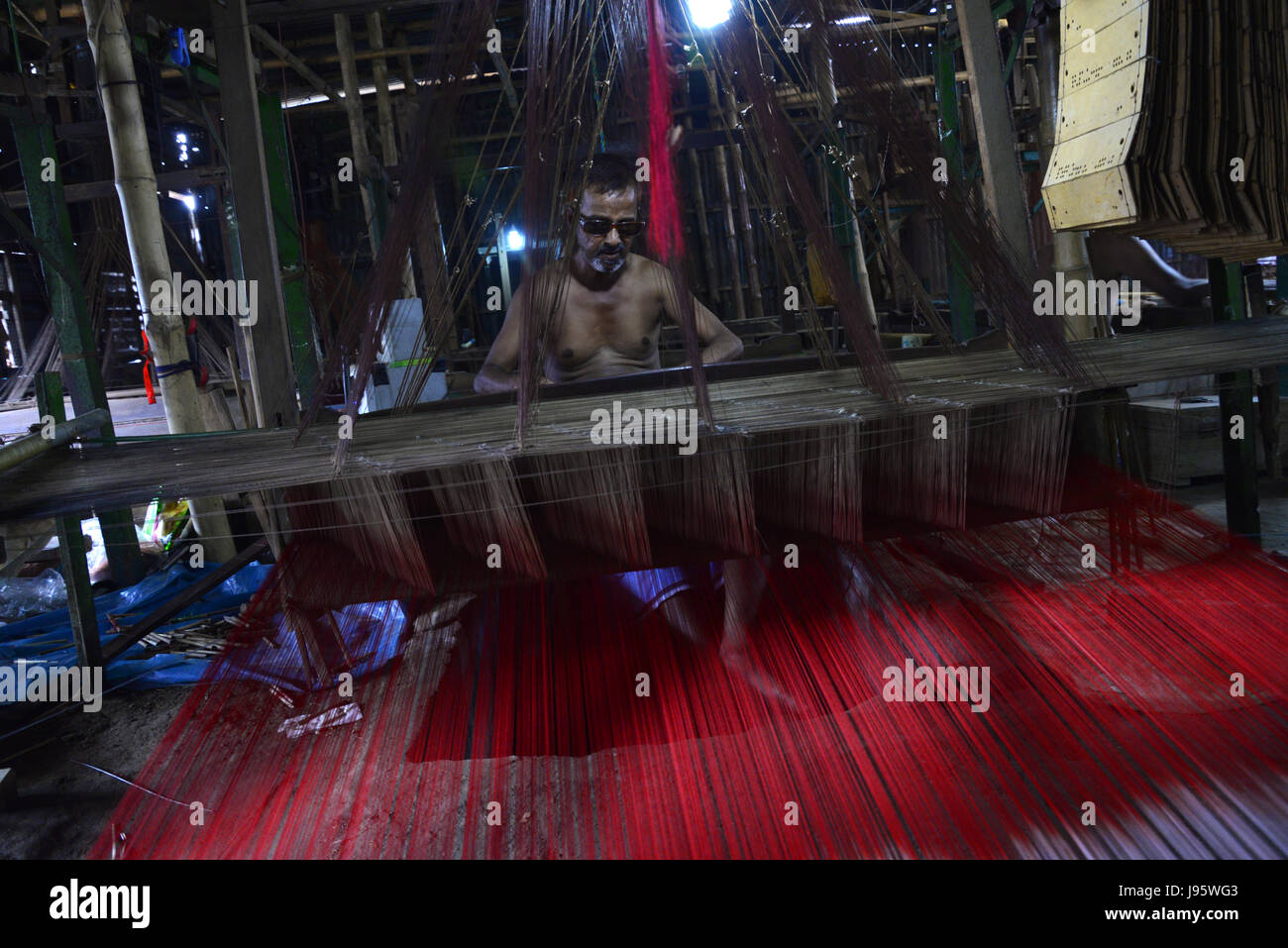 Bangladeshi woman weaving in hi-res stock photography and images - Alamy