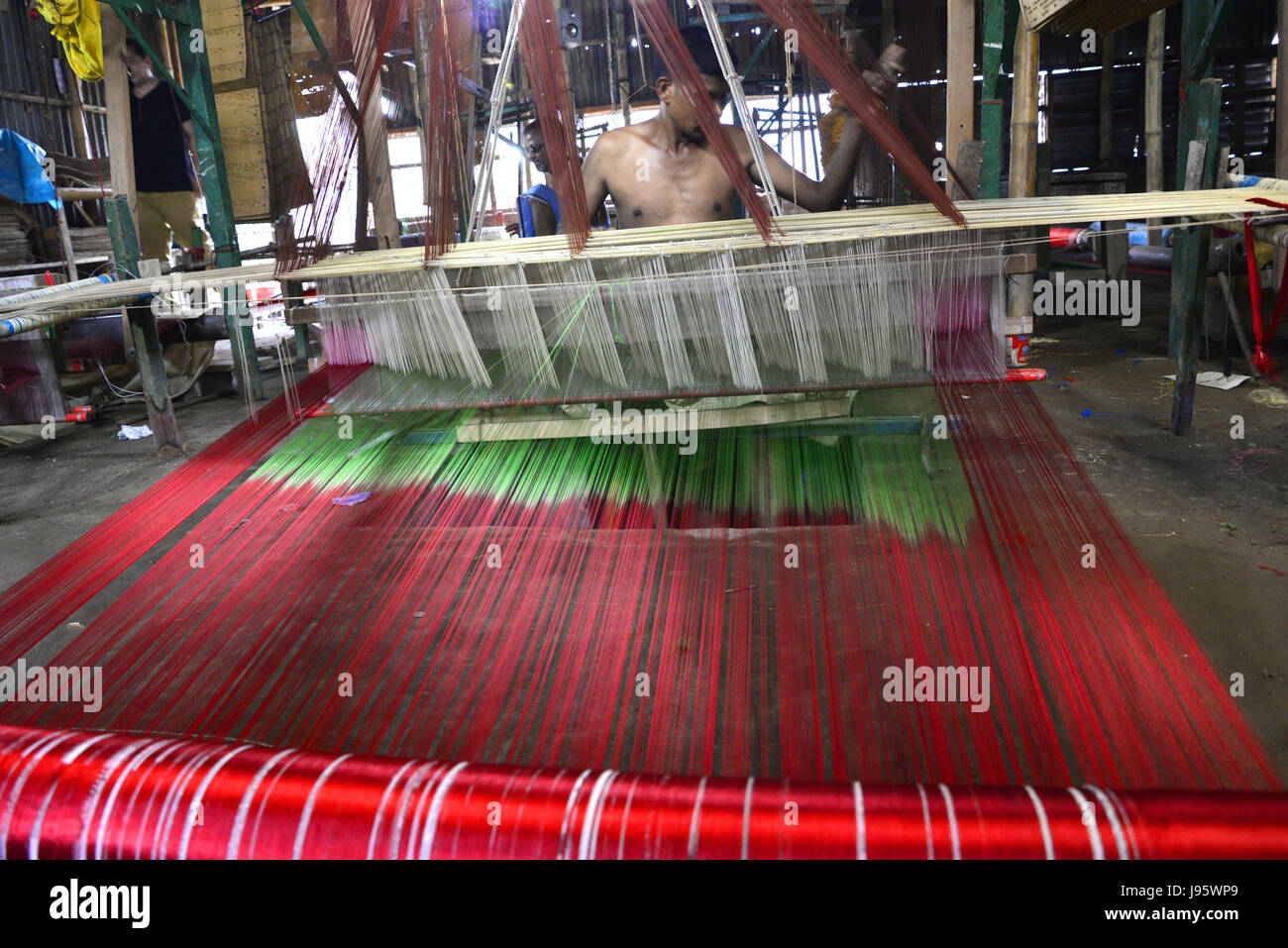 Bangladeshi woman weaving in hi-res stock photography and images - Alamy