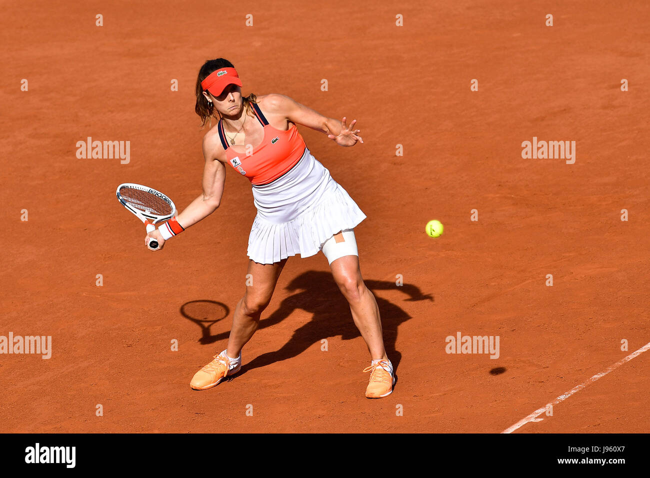 Paris. 5th June, 2017. Alize Cornet of France returns the ball to ...