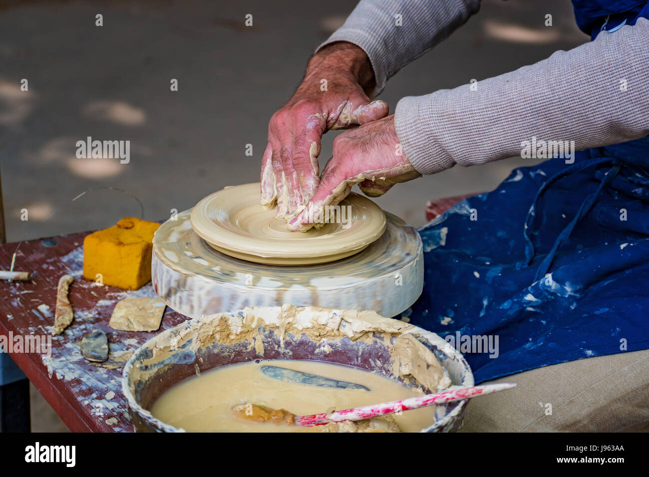 Pottery making on a pottery wheel Stock Photo - Alamy