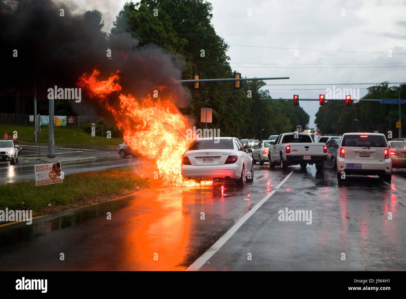 Car fire in street - USA Stock Photo - Alamy