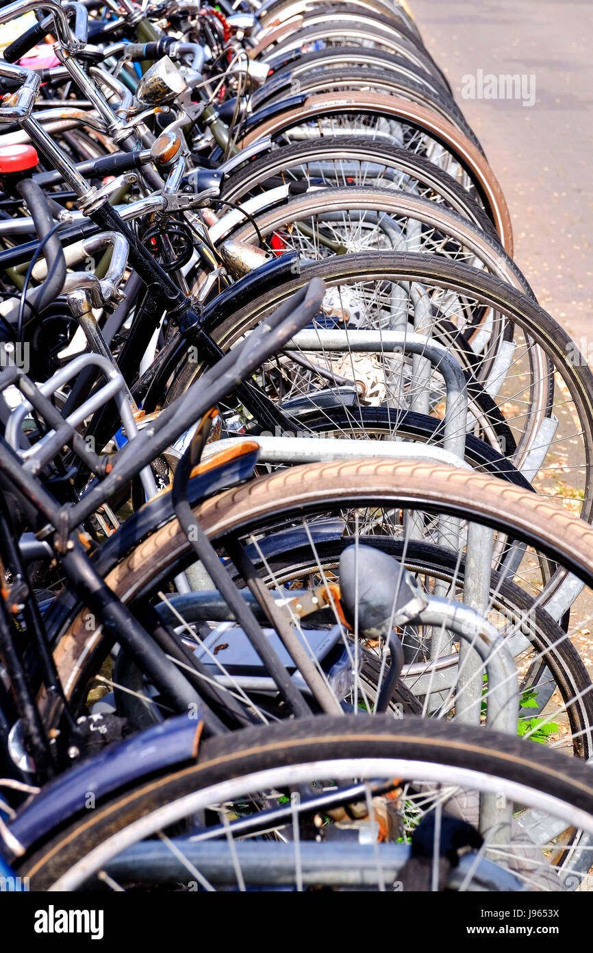 front wheels of bikes in bicycle rack in Amsterdam Stock Photo - Alamy