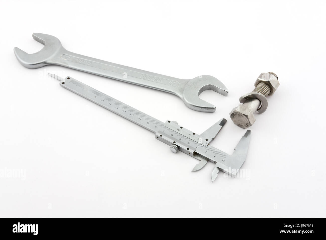wrench and caliper Stock Photo - Alamy