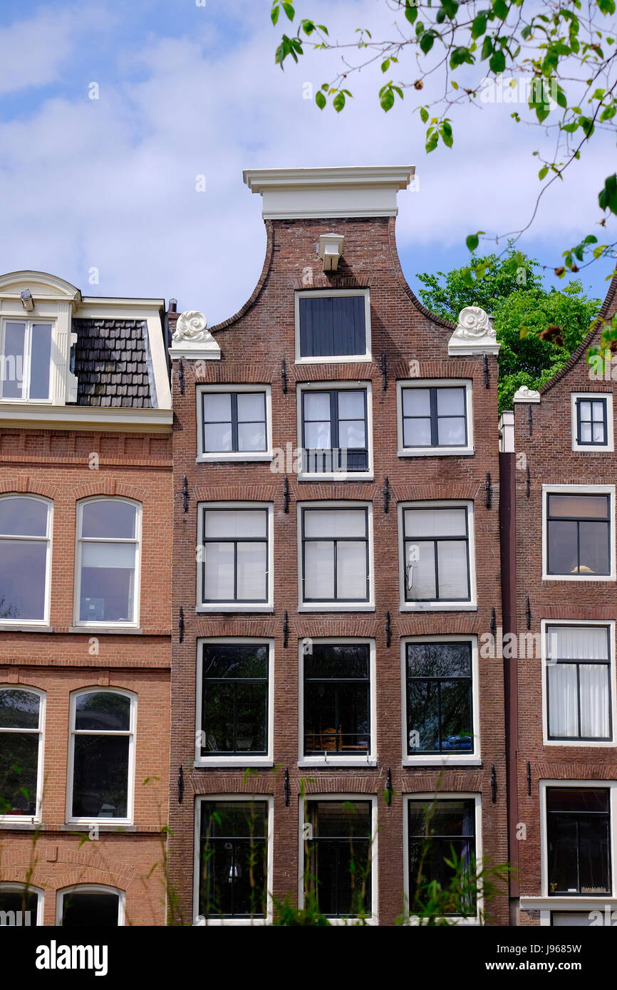 a detail of the gable ends of a dutch canal side house in Amsterdam ...