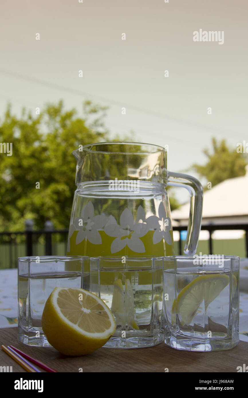 Decanter lemonade glasses Stock Photo - Alamy