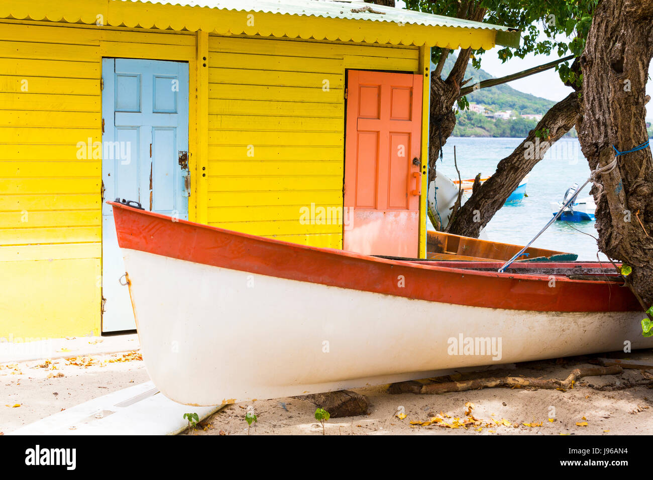 Orange colored small boat hi-res stock photography and images - Alamy
