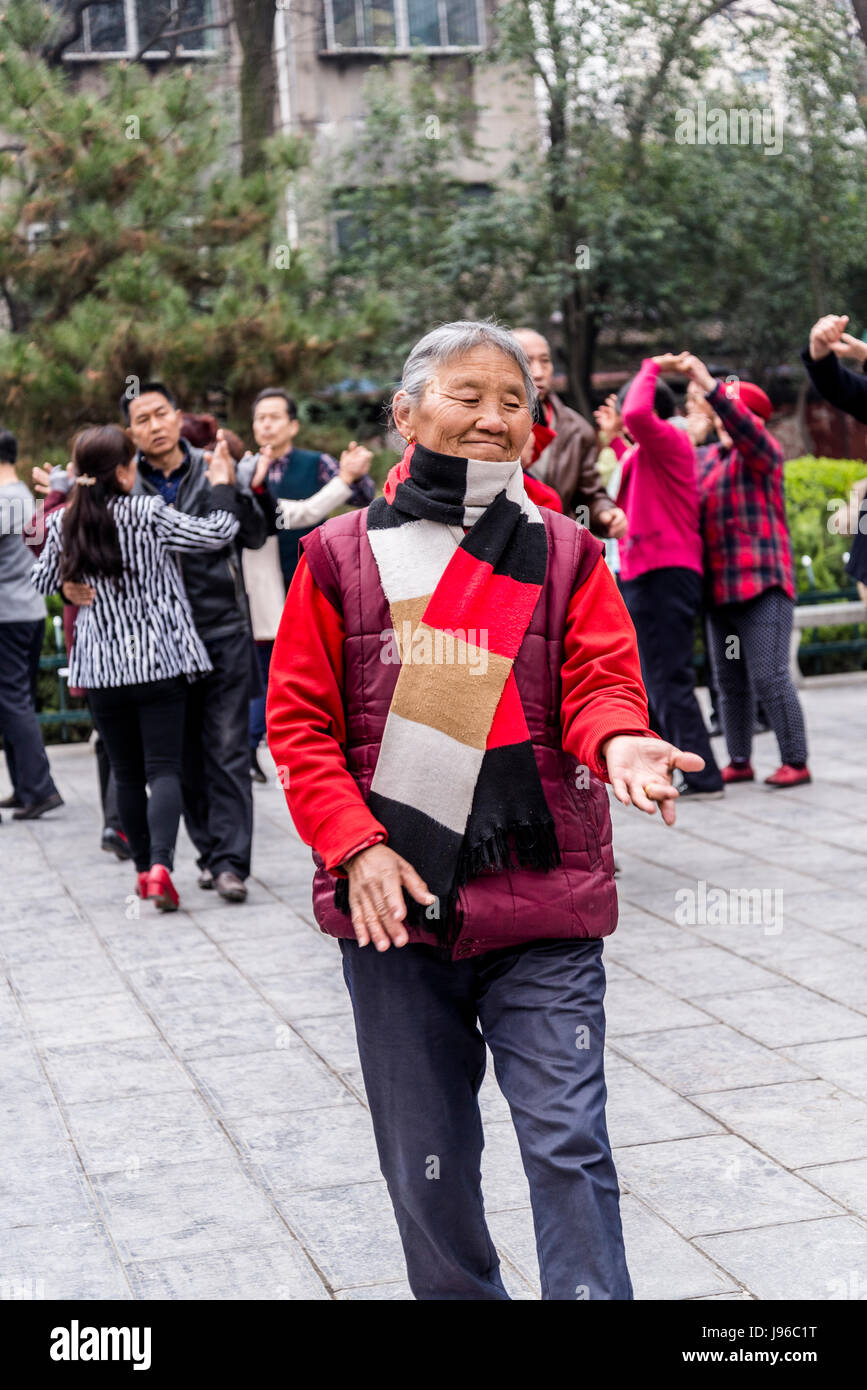 Elderly people dancing in a public park, Xi'an, Shaanxi province, China ...