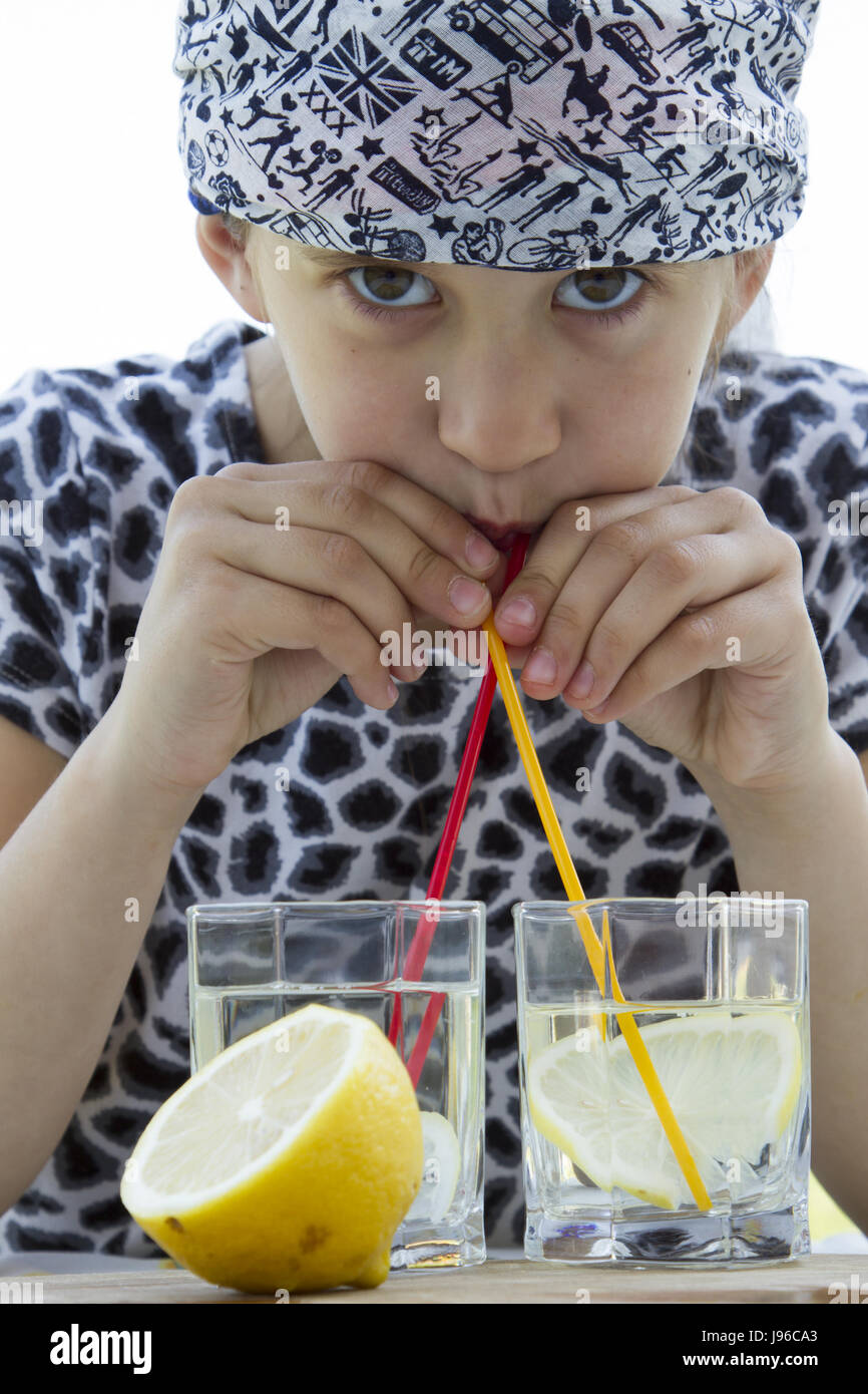 Adorable girl drinking lemonade in outdoor restaurant Stock Photo - Alamy