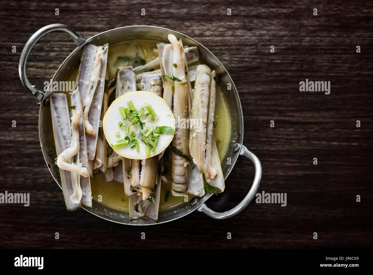 portuguese fresh razor shell seafood steamed in garlic herb white wine ...