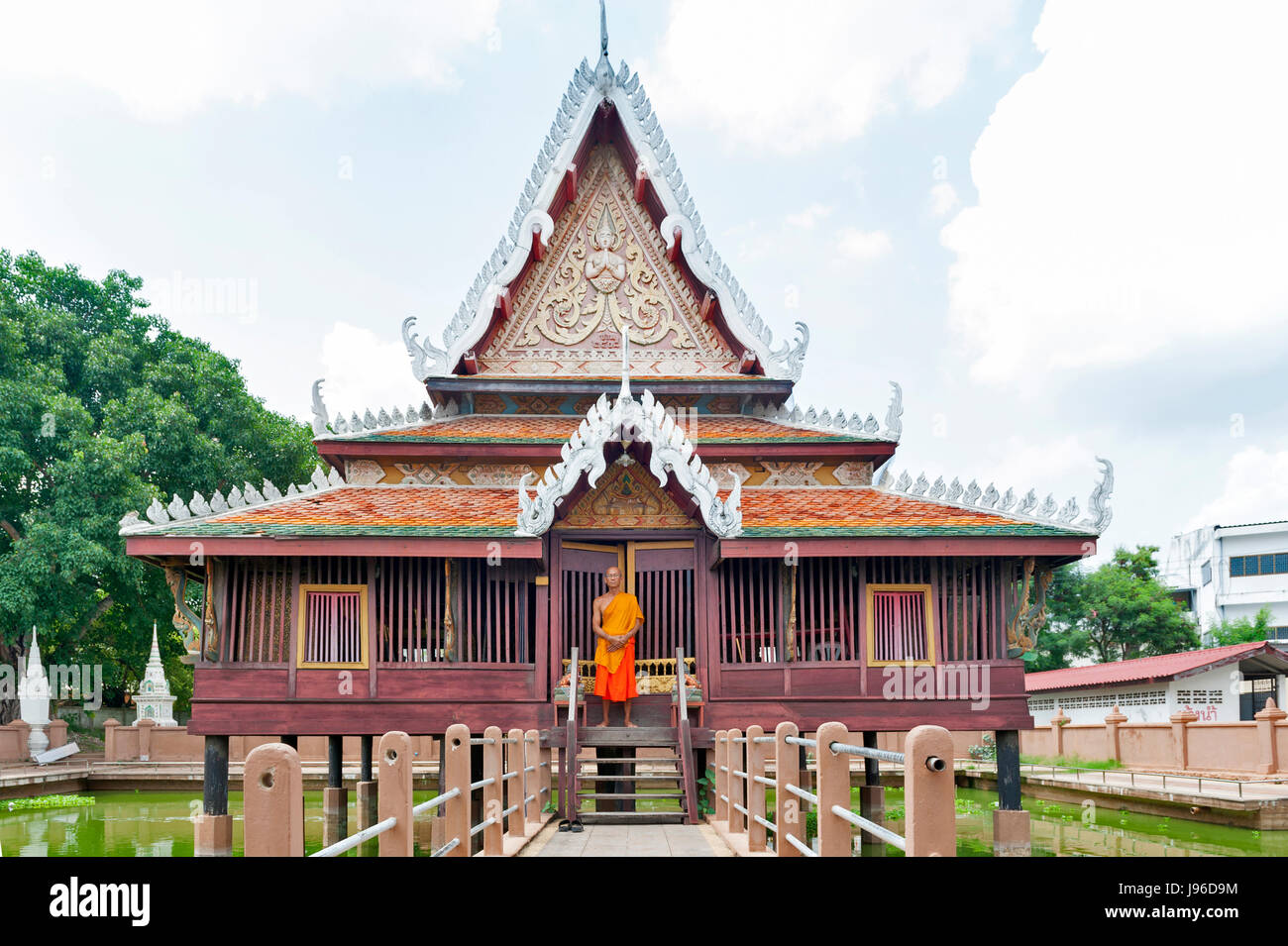 Thai Buddhist monk at Ho Trai - Buddhist scriptures or Tripitaka ...