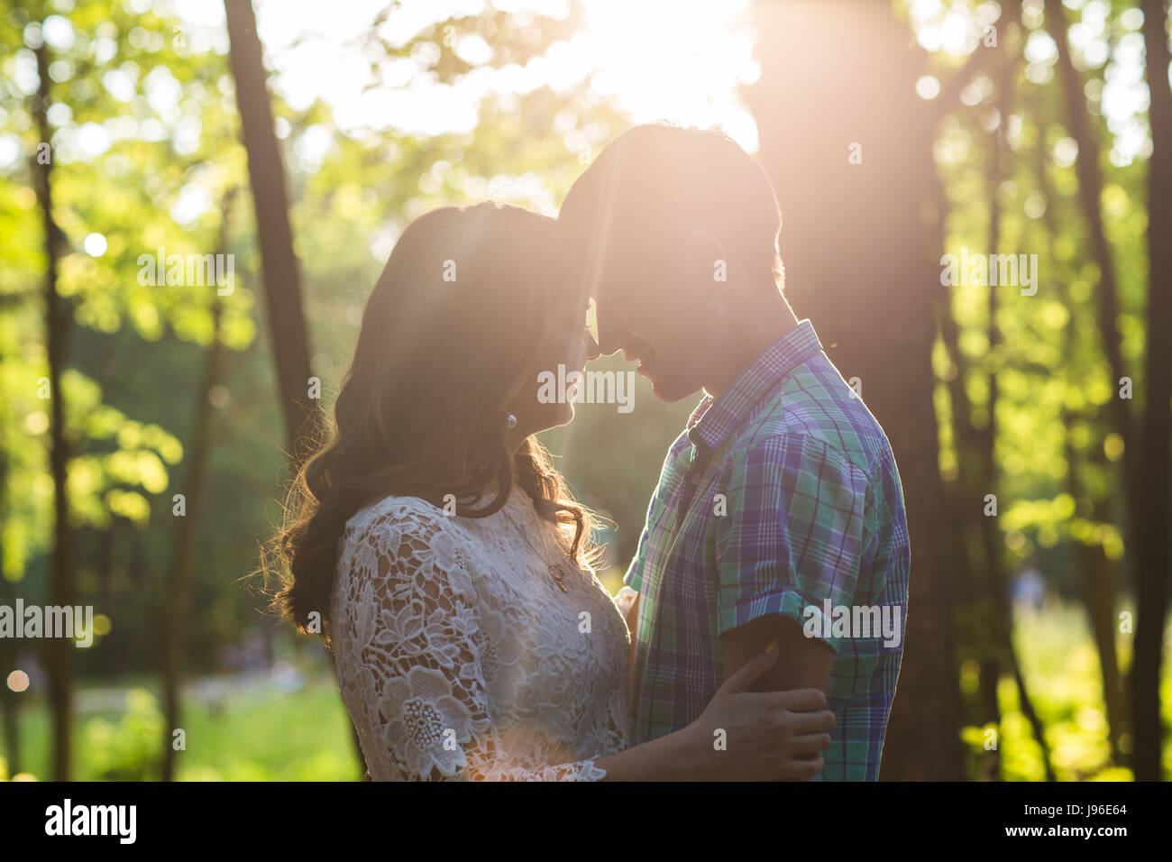 Romantic young love couple in summer nature Stock Photo - Alamy