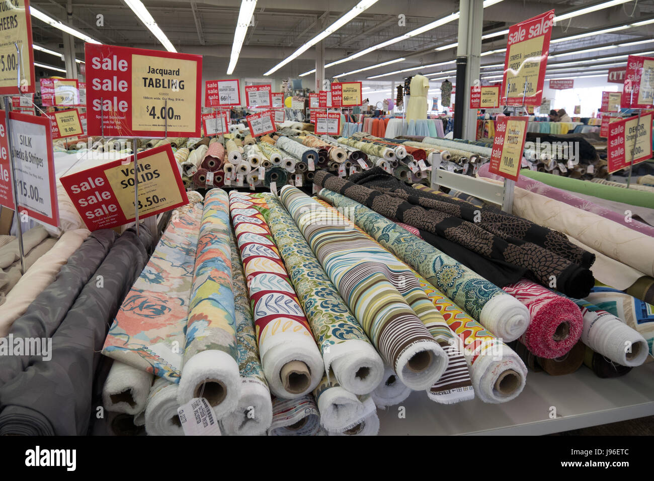 rolls of fabric in a retail store Stock Photo - Alamy