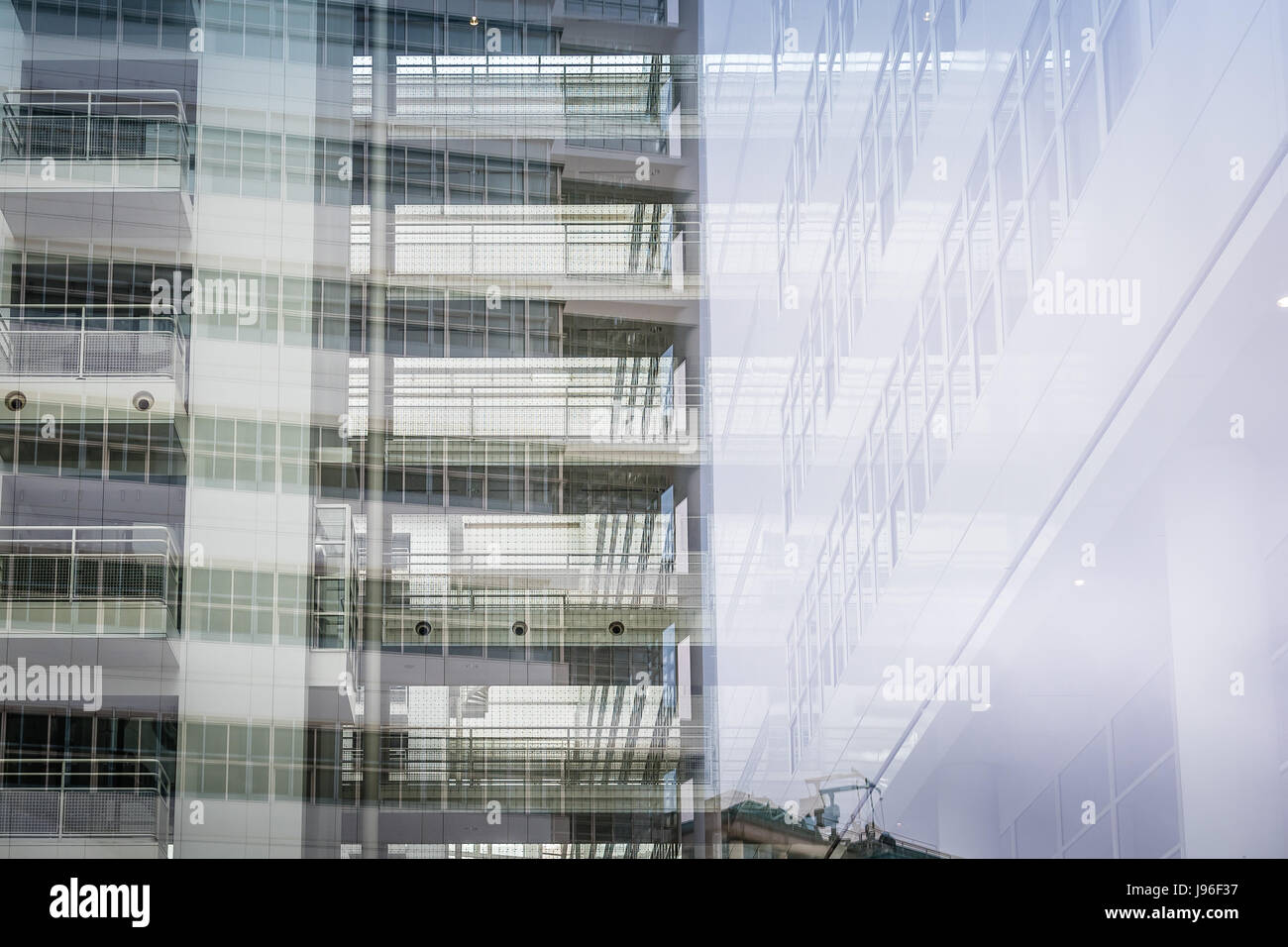 Reflections on abstract curtain wall in modern office building Stock ...