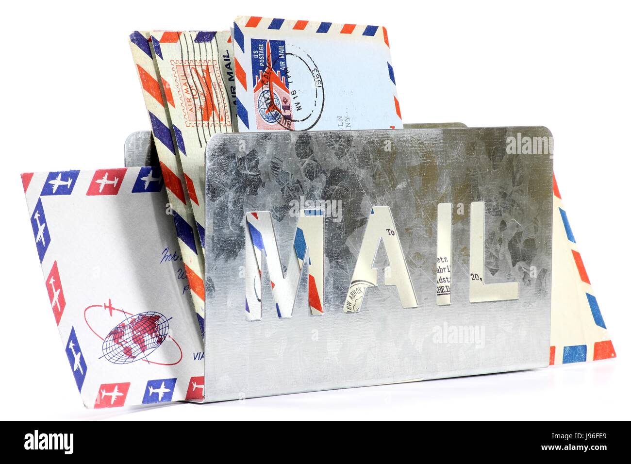 airmail letters in metal holder isolated on white background Stock ...