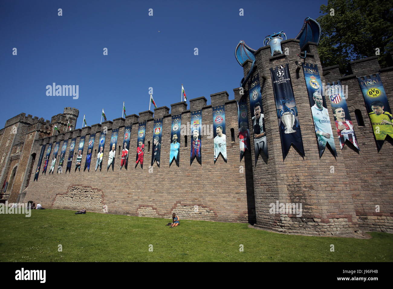 A blue dragon, the trophy and a series of UEFA banners draped outside ...