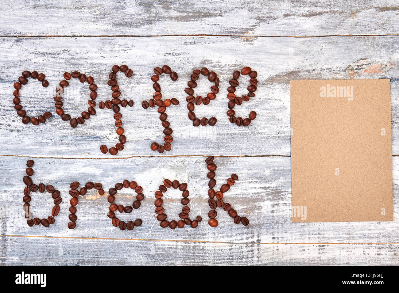 Coffee grain and paper Stock Photo - Alamy