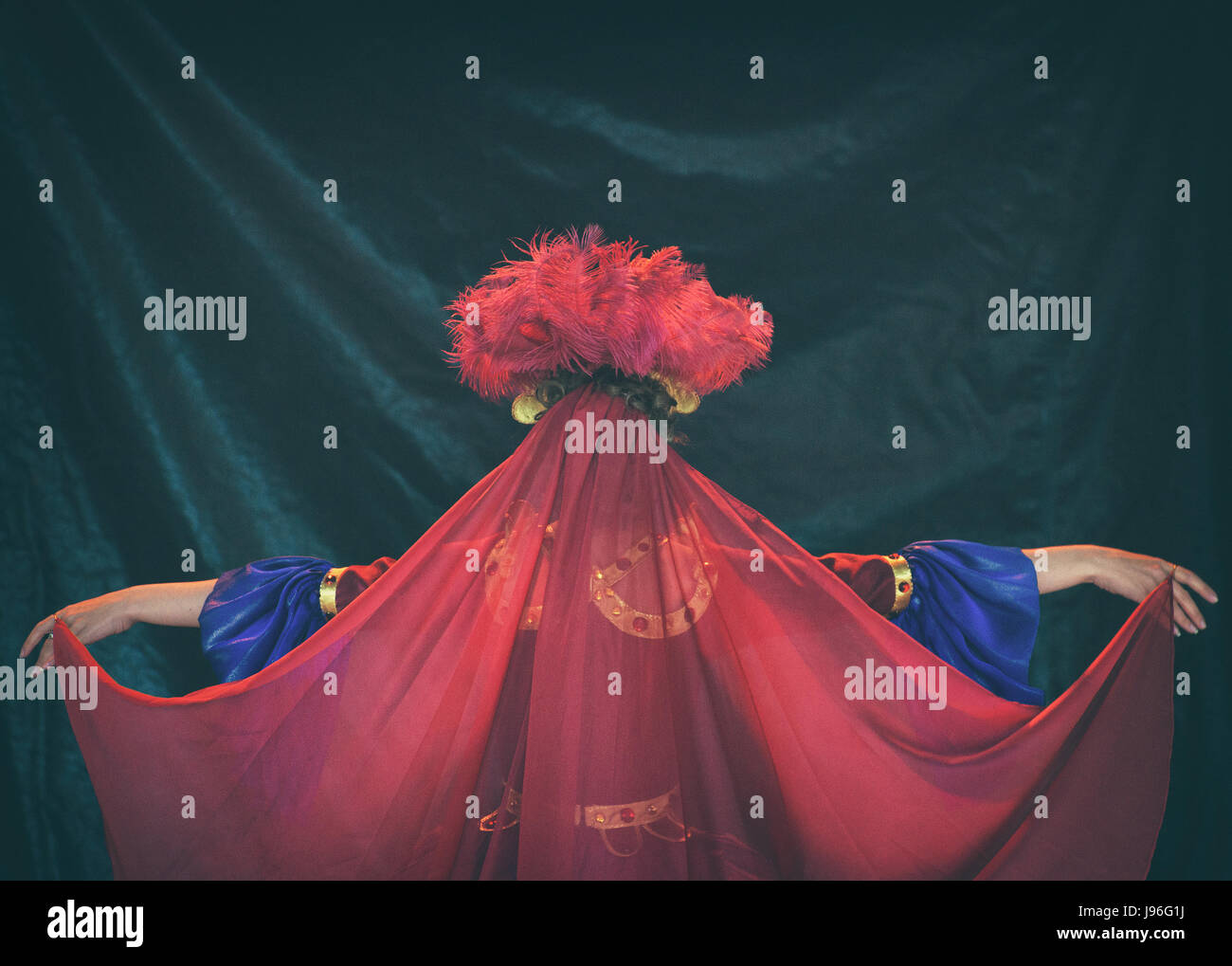 Woman magician showing magic trick hi-res stock photography and images ...