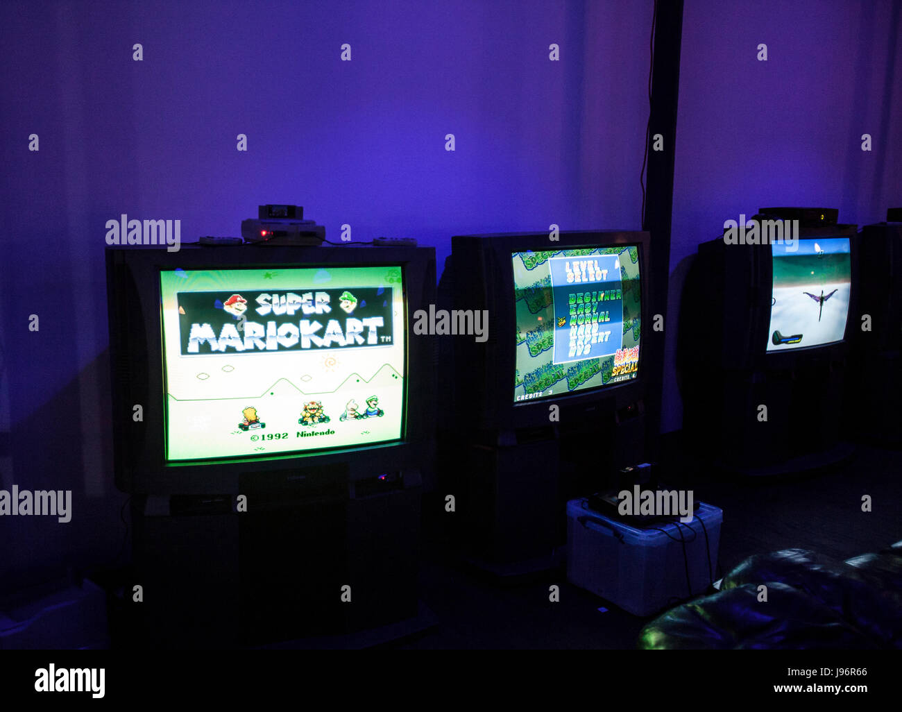 Various collection of arcades. Games being refurbished and fixed, retro ...