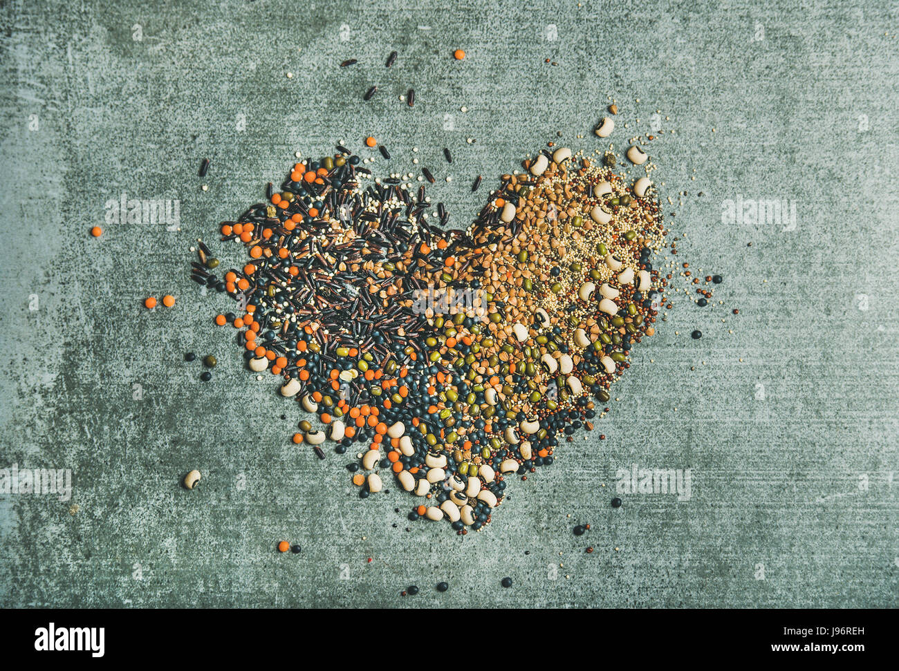 Various raw grains, beans and cereals in shape of heart Stock Photo - Alamy