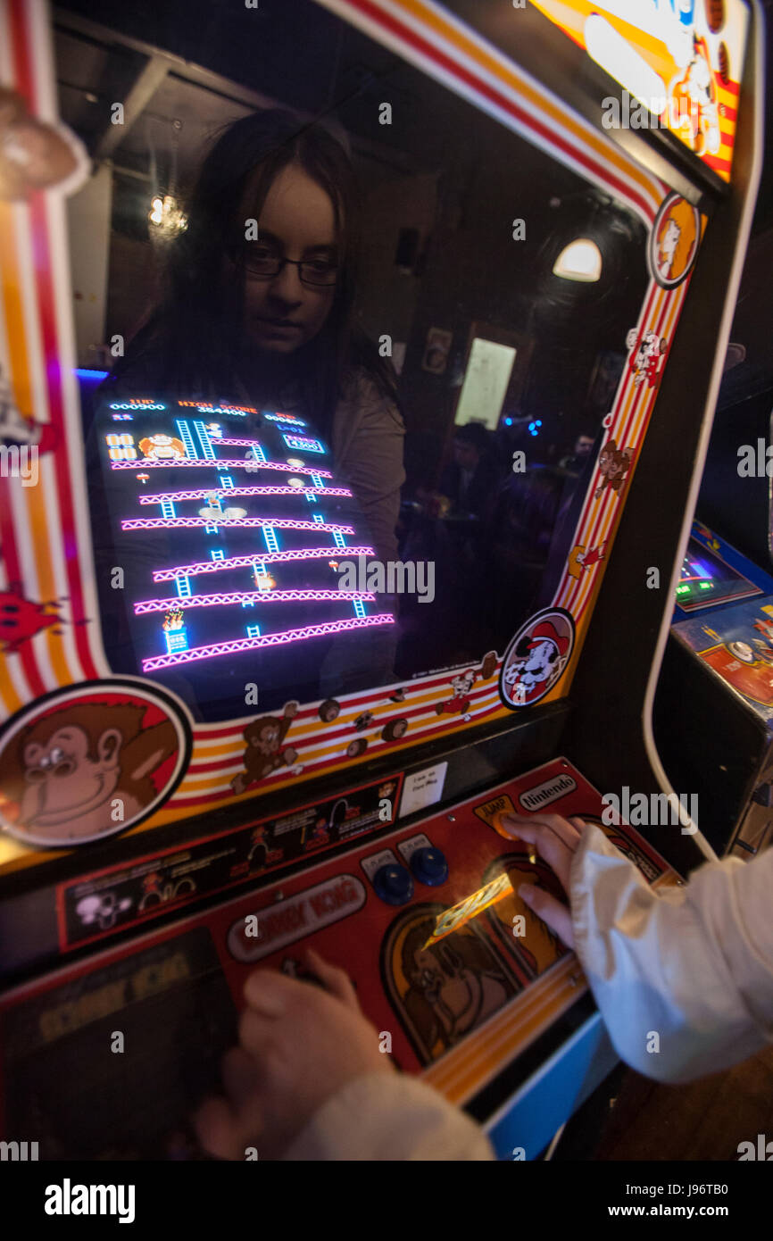 Various collection of arcades. Games being refurbished and fixed, retro ...