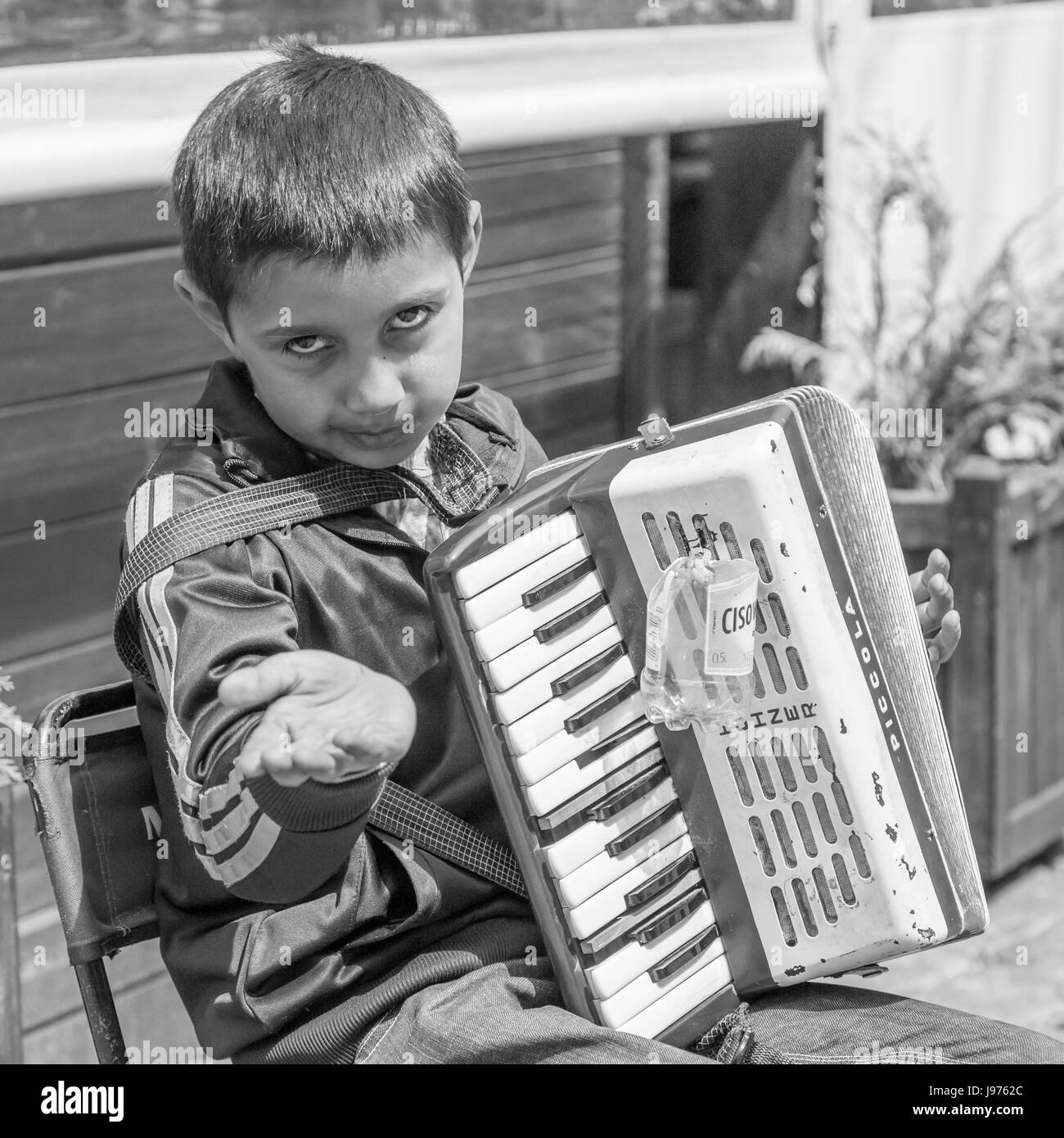Poverty, romanian child begging on the street, Poland Stock Photo - Alamy
