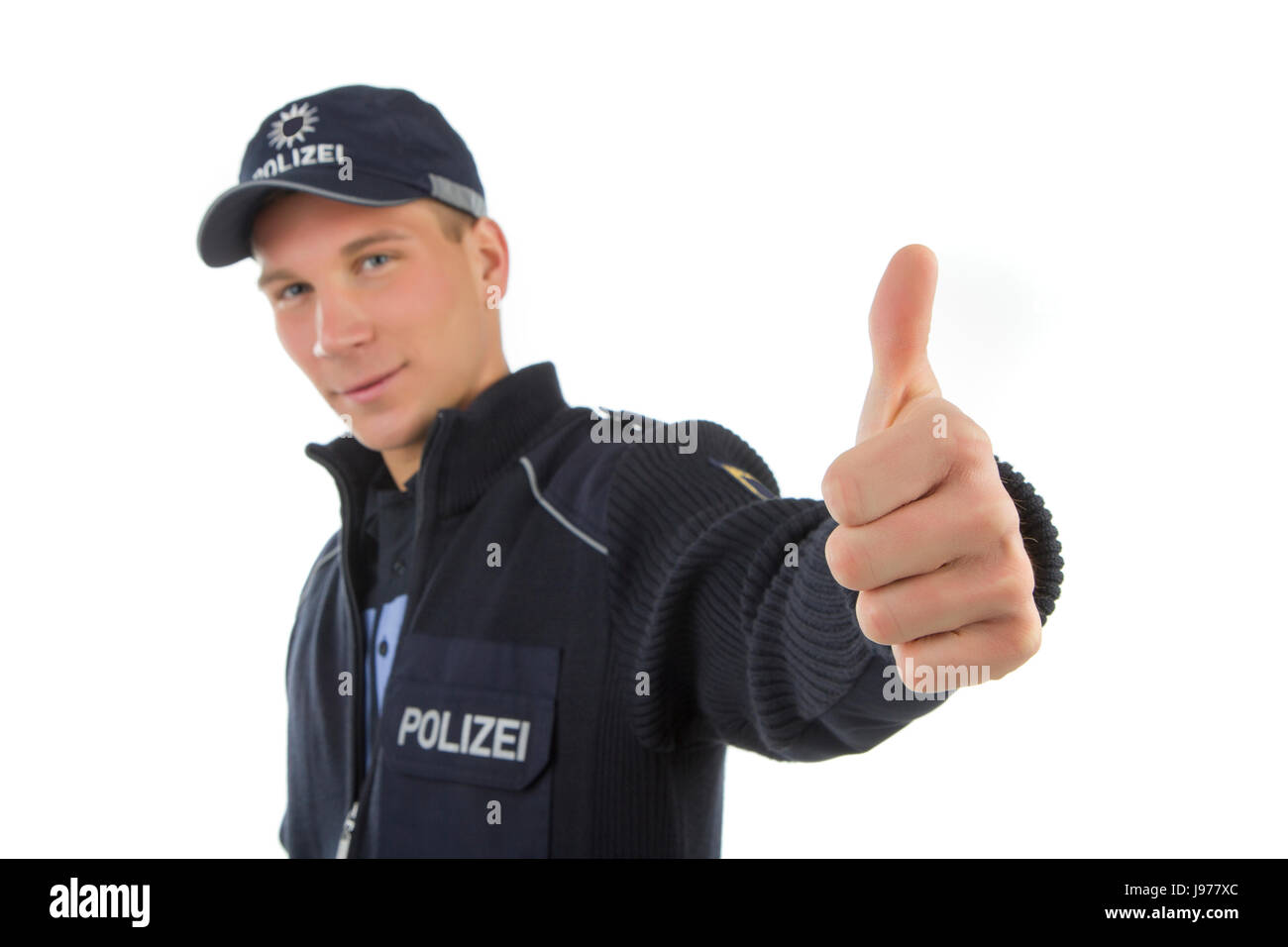 police in uniform holding thumbs up Stock Photo - Alamy