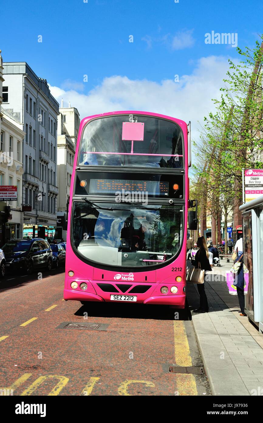 A city double-decker bus in a bus lane in Belfast city center on ...