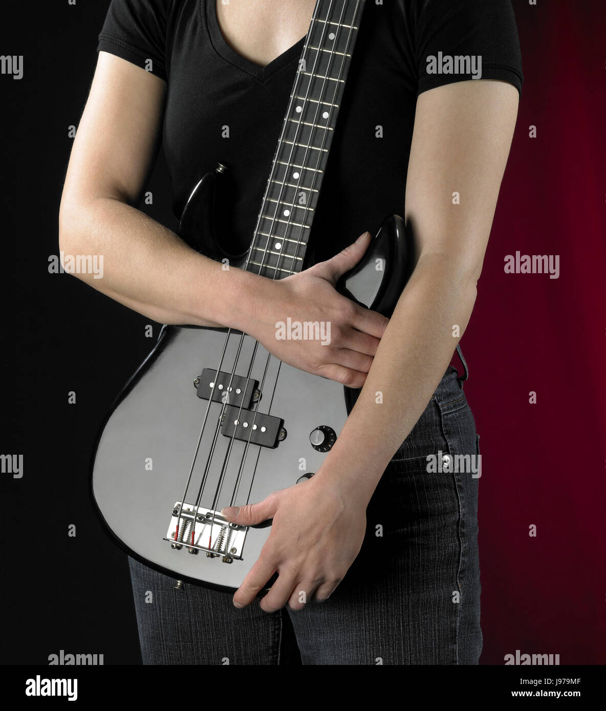 woman with bass guitar Stock Photo - Alamy
