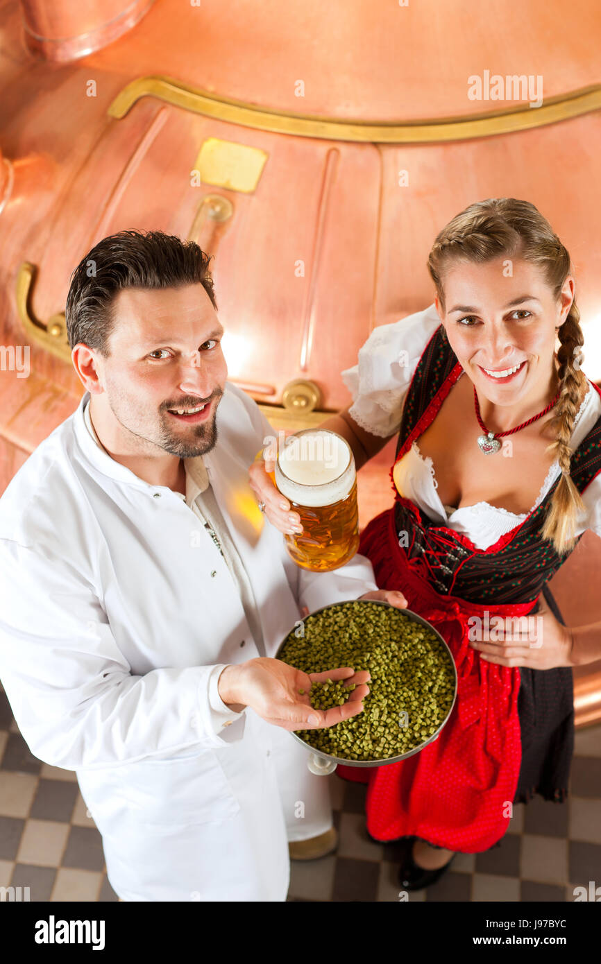 brewmaster and woman with beer in brewery Stock Photo - Alamy