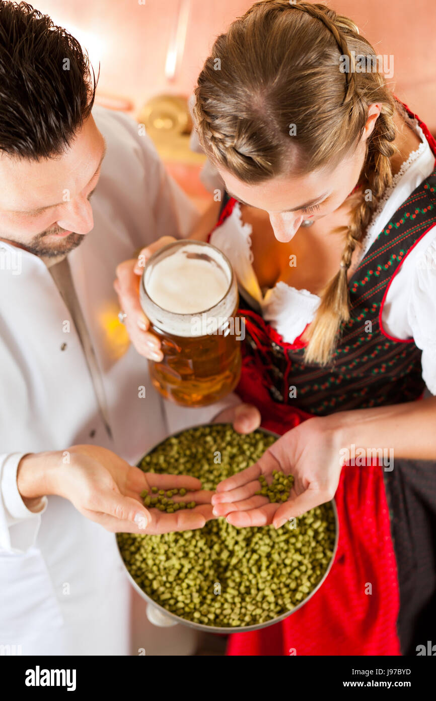 brewmaster and woman with beer in brewery Stock Photo - Alamy