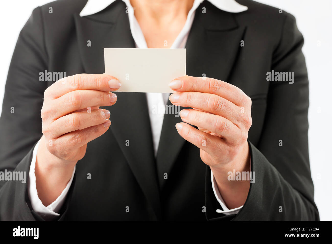 elderly woman reading a visiting card Stock Photo - Alamy