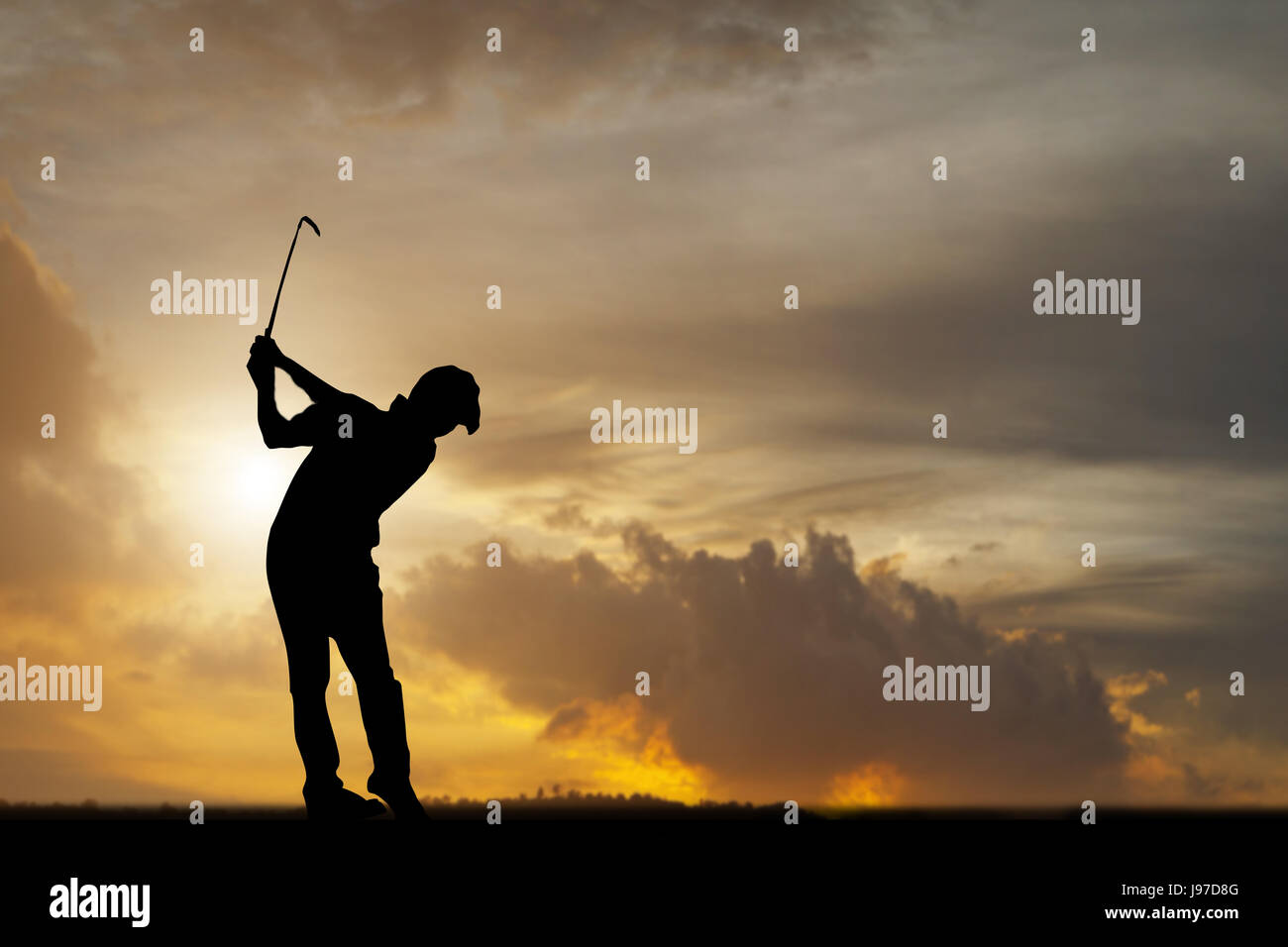 silhouette of golfers hit sweeping and keep golf course in the summer ...