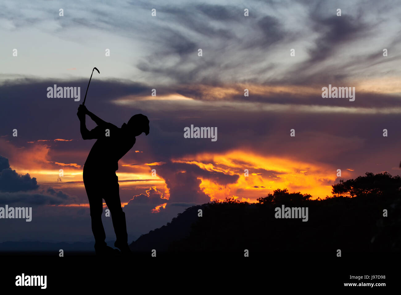 silhouette of golfers hit sweeping and keep golf course in the summer ...