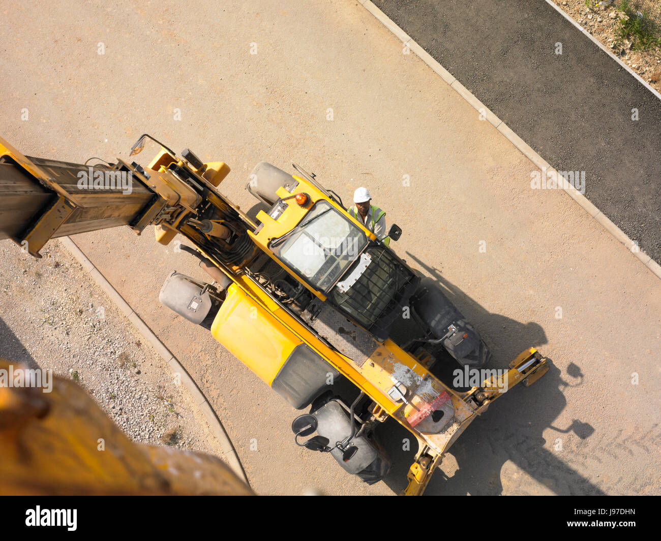 Blue yellow cherry picker hi-res stock photography and images - Alamy