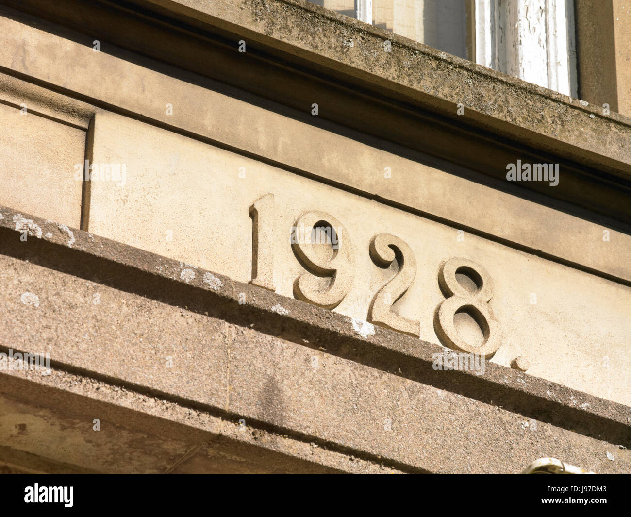 1928 carved stone sign Stock Photo - Alamy